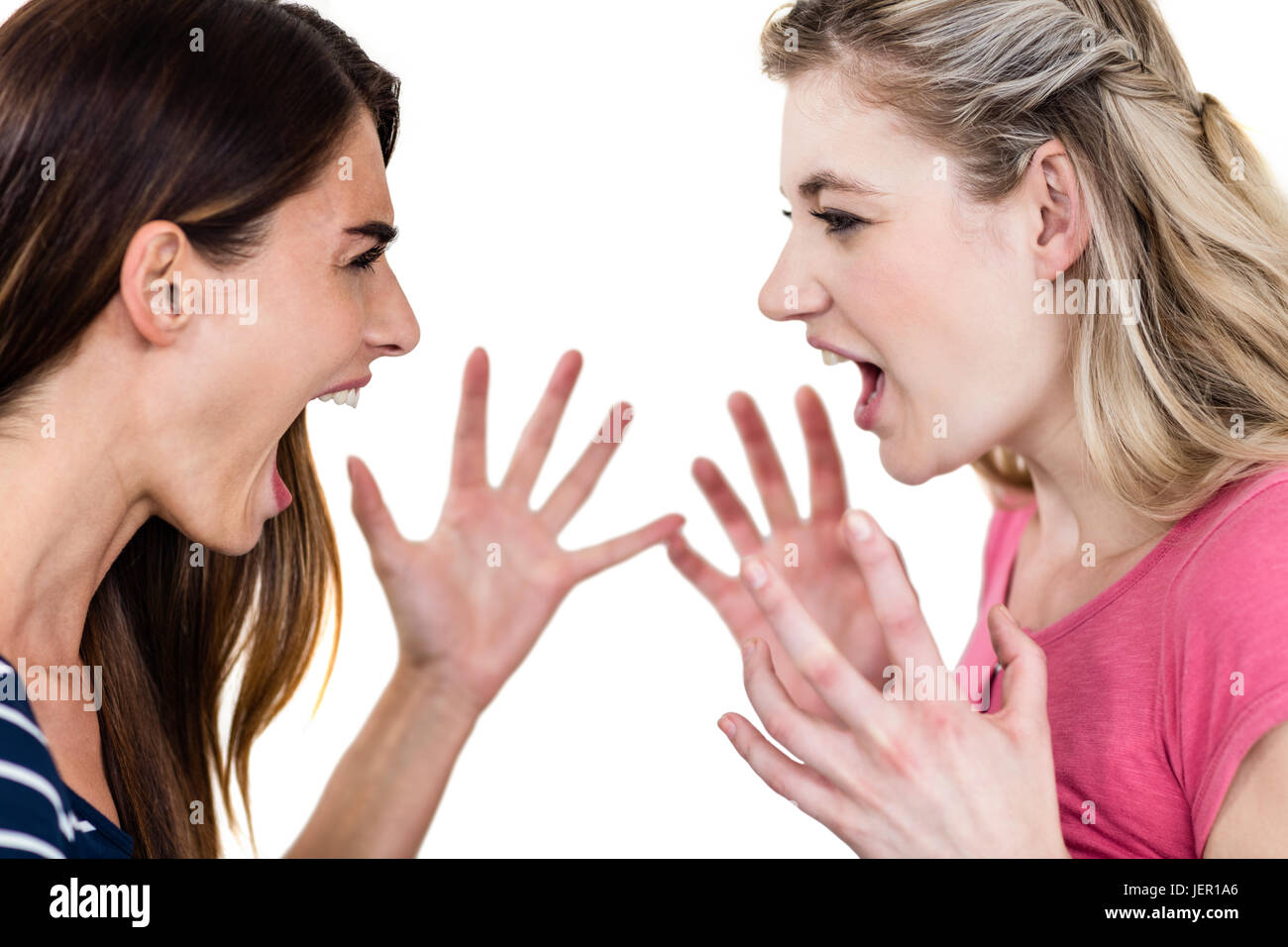 Female friends shouting while standing Stock Photo - Alamy
