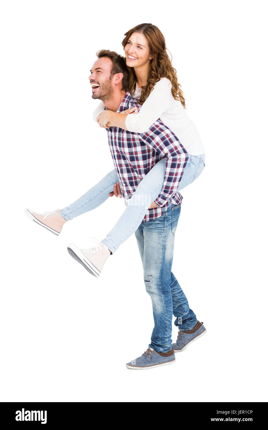Woman giving piggyback ride man hi-res stock photography and images - Alamy