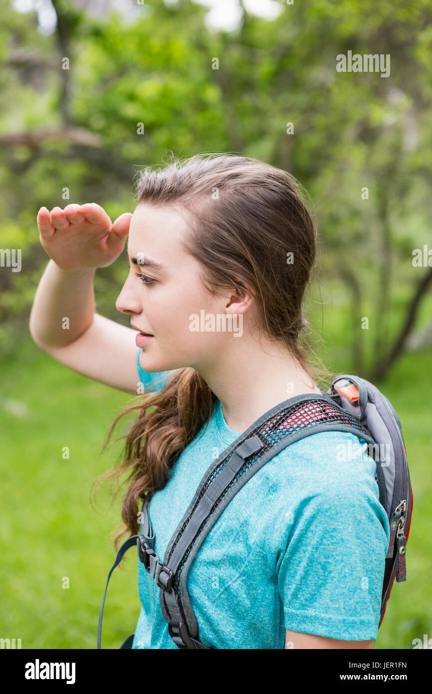Woman observing something Stock Photo - Alamy
