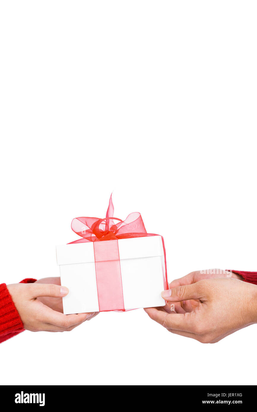 Hands presenting red gift hi-res stock photography and images - Alamy