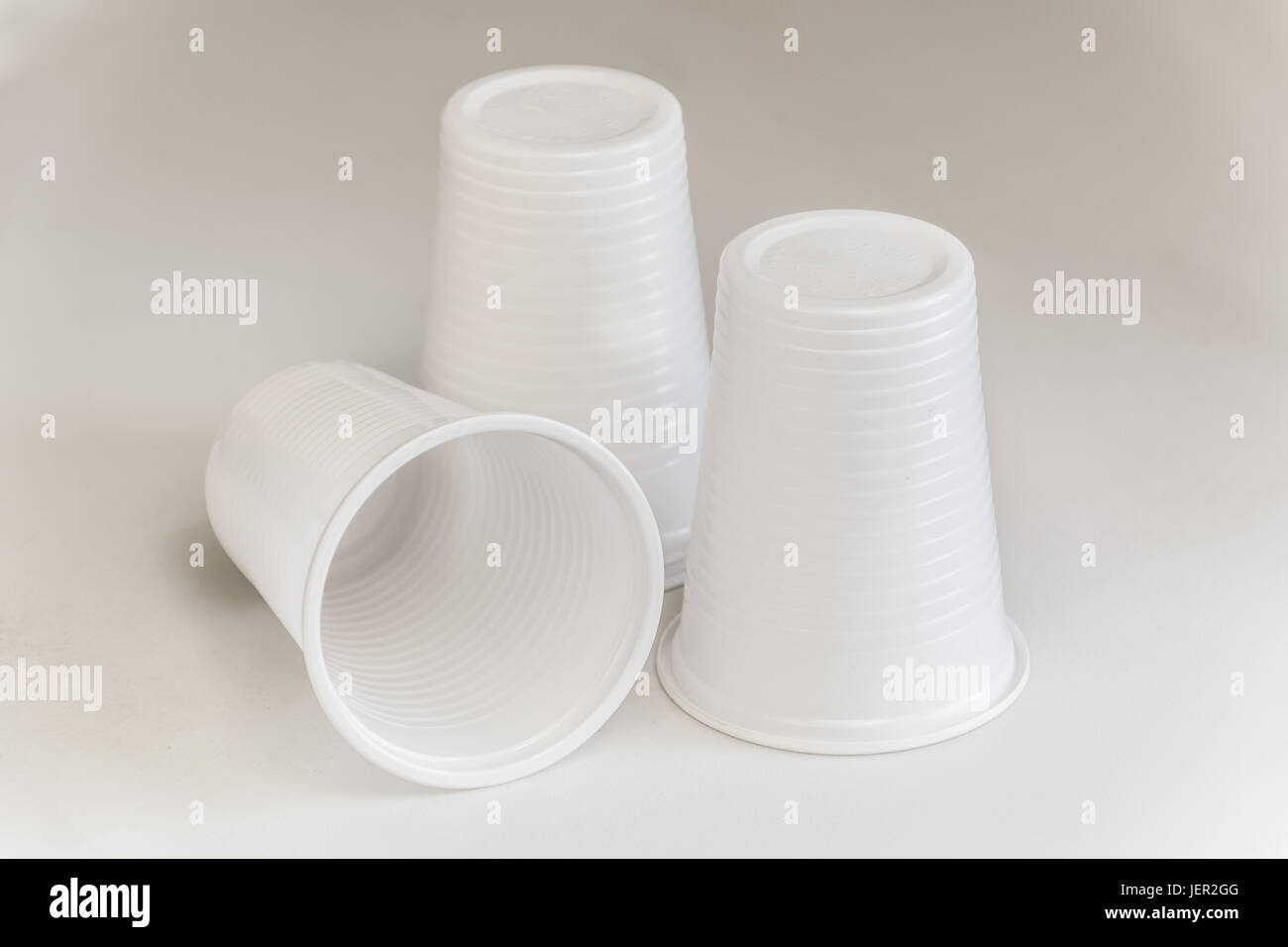 Three Plastic glasses Stock Photo - Alamy
