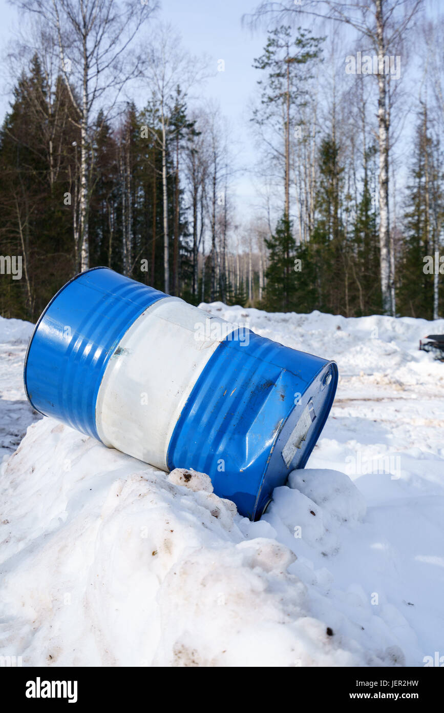 Image of striped barrel on snow in forest Stock Photo - Alamy