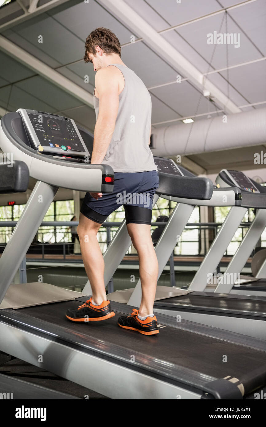Man walking on thread mill Stock Photo - Alamy