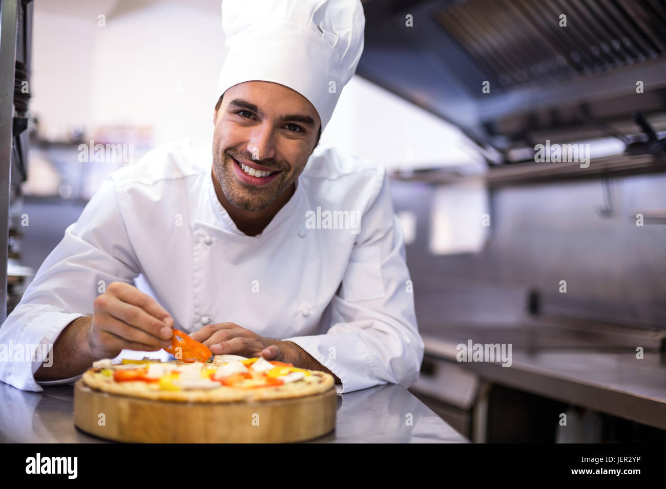 Pizza chef making pizza Stock Photo - Alamy