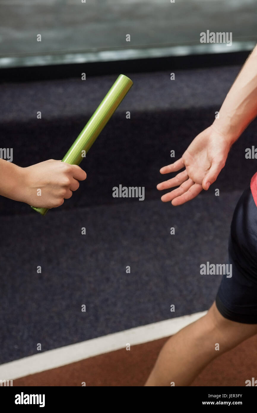 Passing the baton hi-res stock photography and images - Alamy