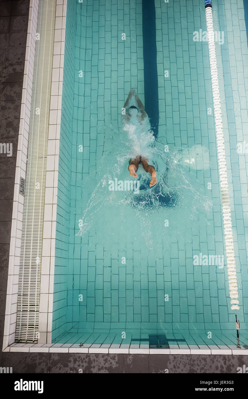 Swimmer diving into the pool Stock Photo - Alamy