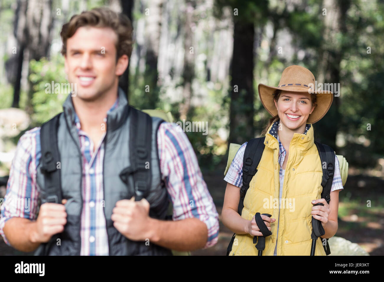 Portrait of woman with partner during hiking Stock Photo - Alamy