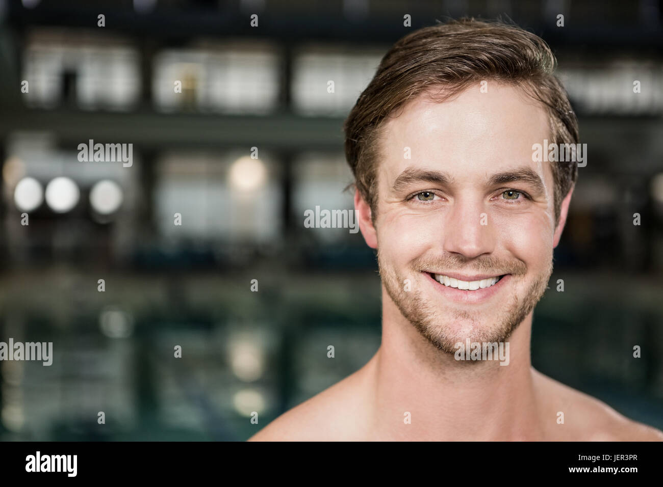 Portrait of swimmer standing near pool Stock Photo - Alamy