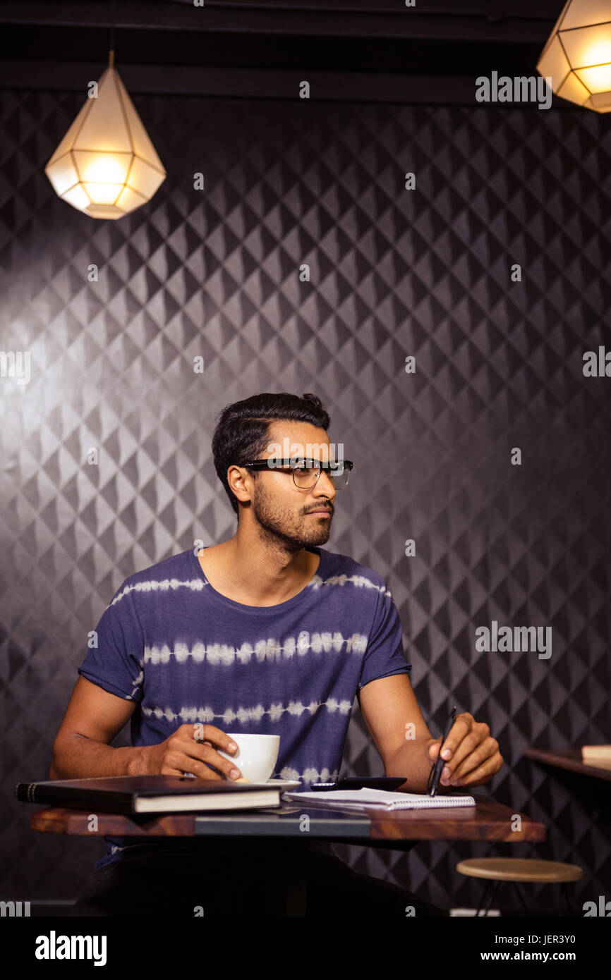 Man taking notes Stock Photo - Alamy