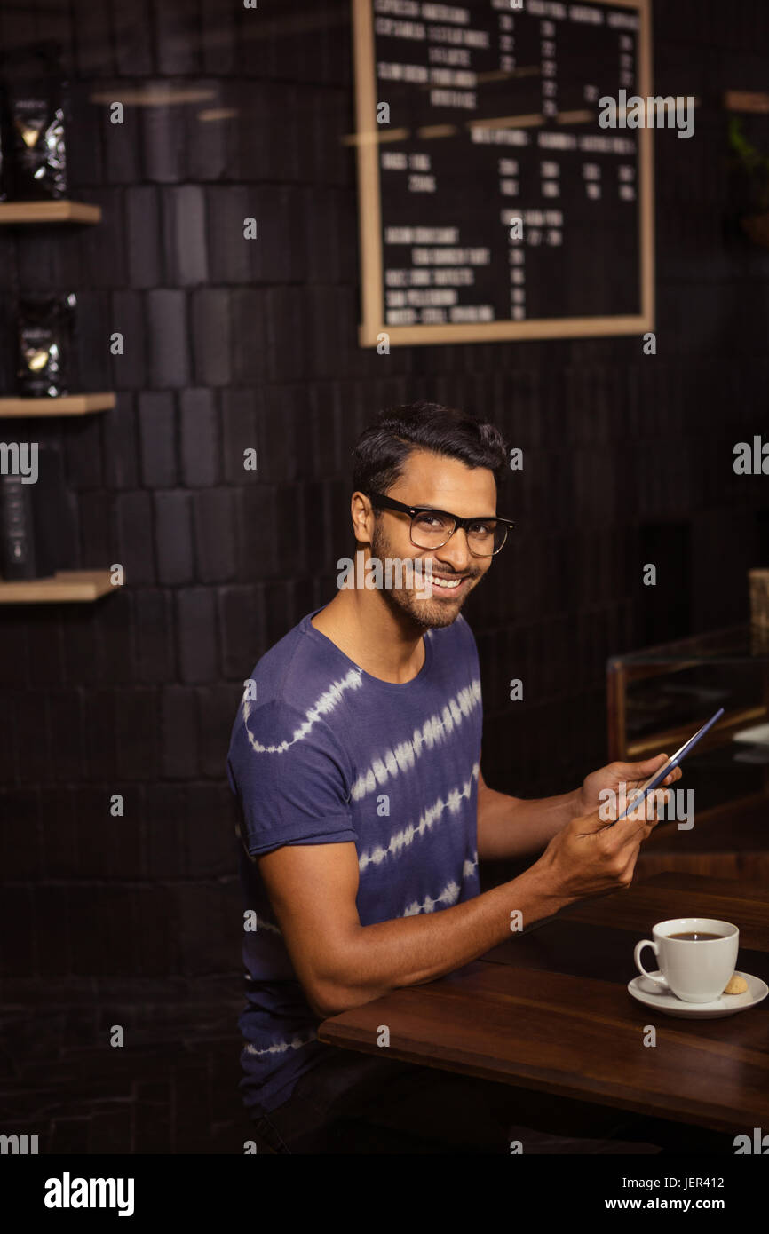 Man using a tablet Stock Photo - Alamy