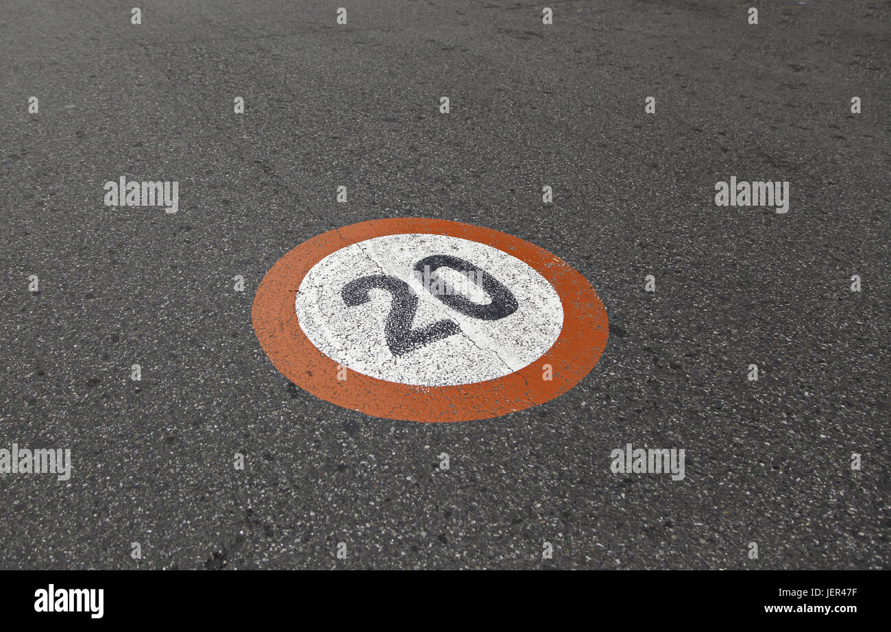 Speed limit sign on asphalt, detail of obligation Stock Photo - Alamy