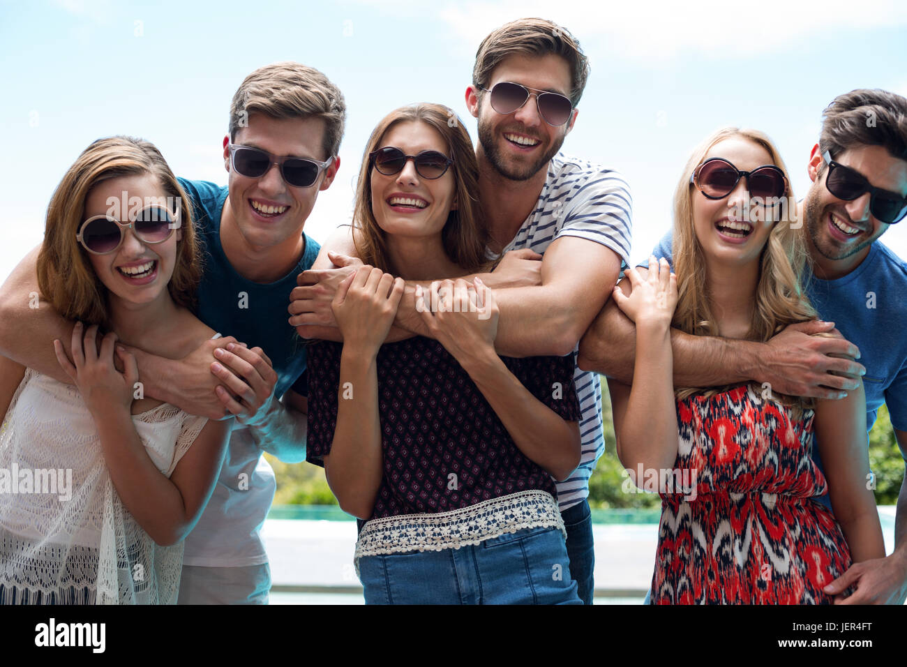 Man woman embracing poolside hi-res stock photography and images - Alamy