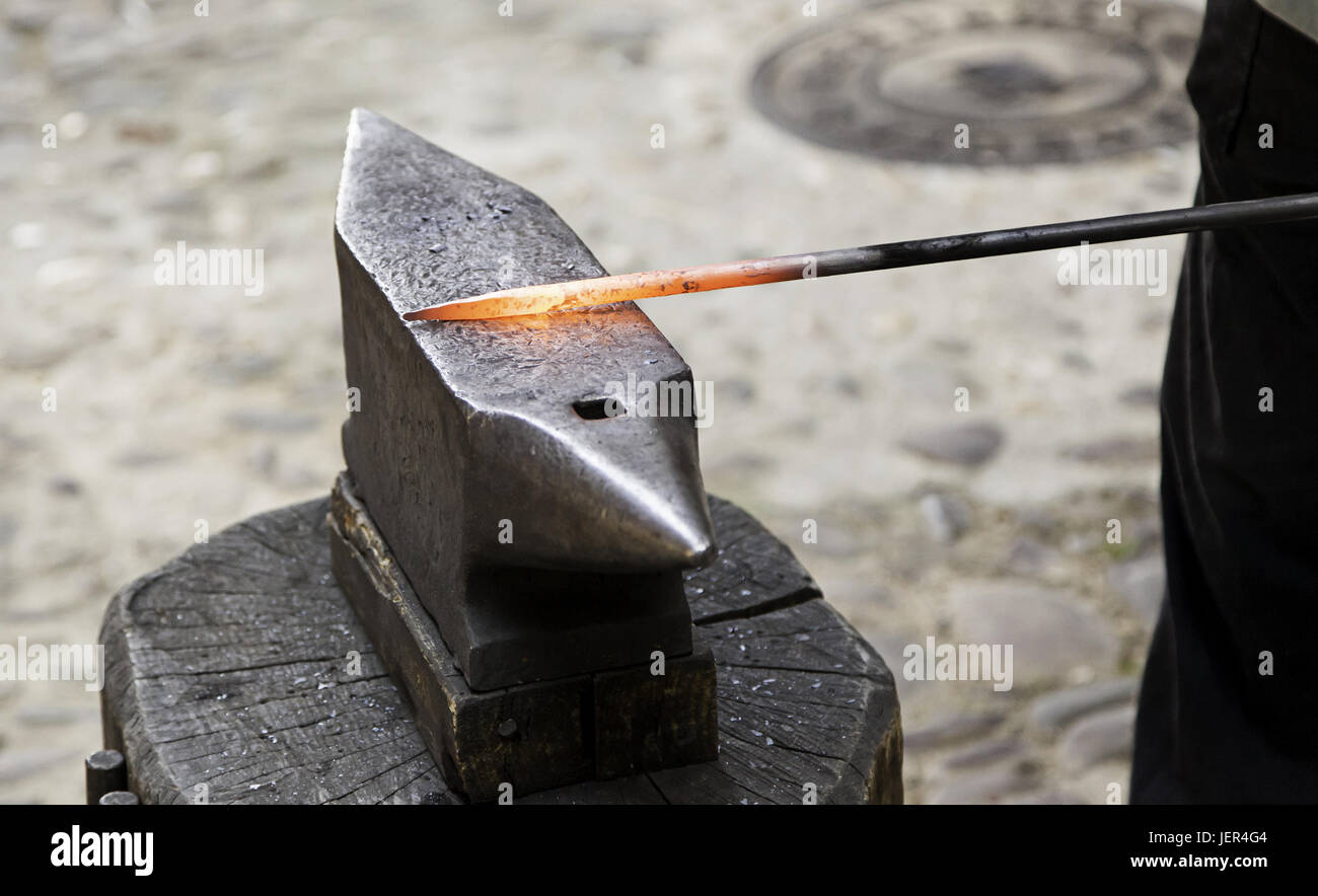 Red hot iron in a forge, working with hot iron, traditional work Stock ...