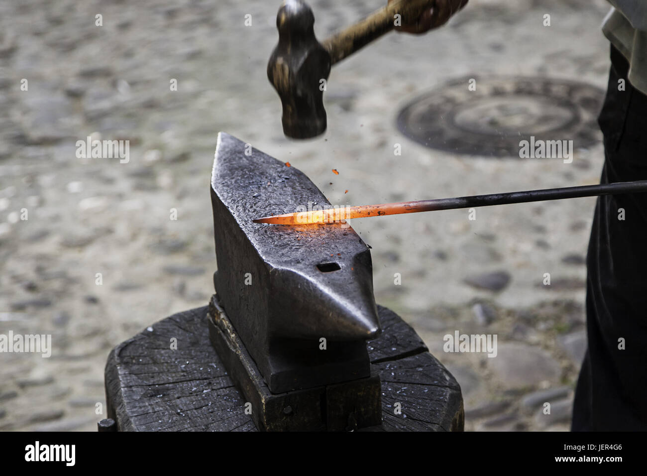Red hot iron in a forge, working with hot iron, traditional work Stock ...