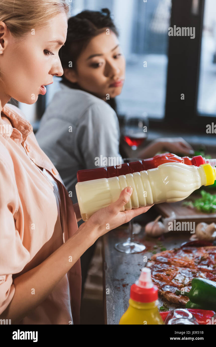 Sauce bottles woman hi-res stock photography and images - Alamy
