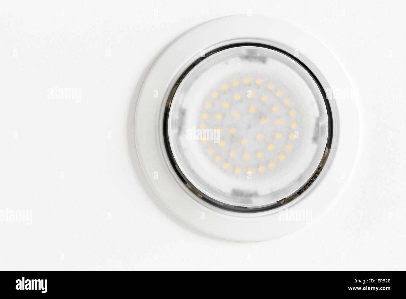 Recessed ceiling LED lamp on white ceiling closeup Stock Photo - Alamy