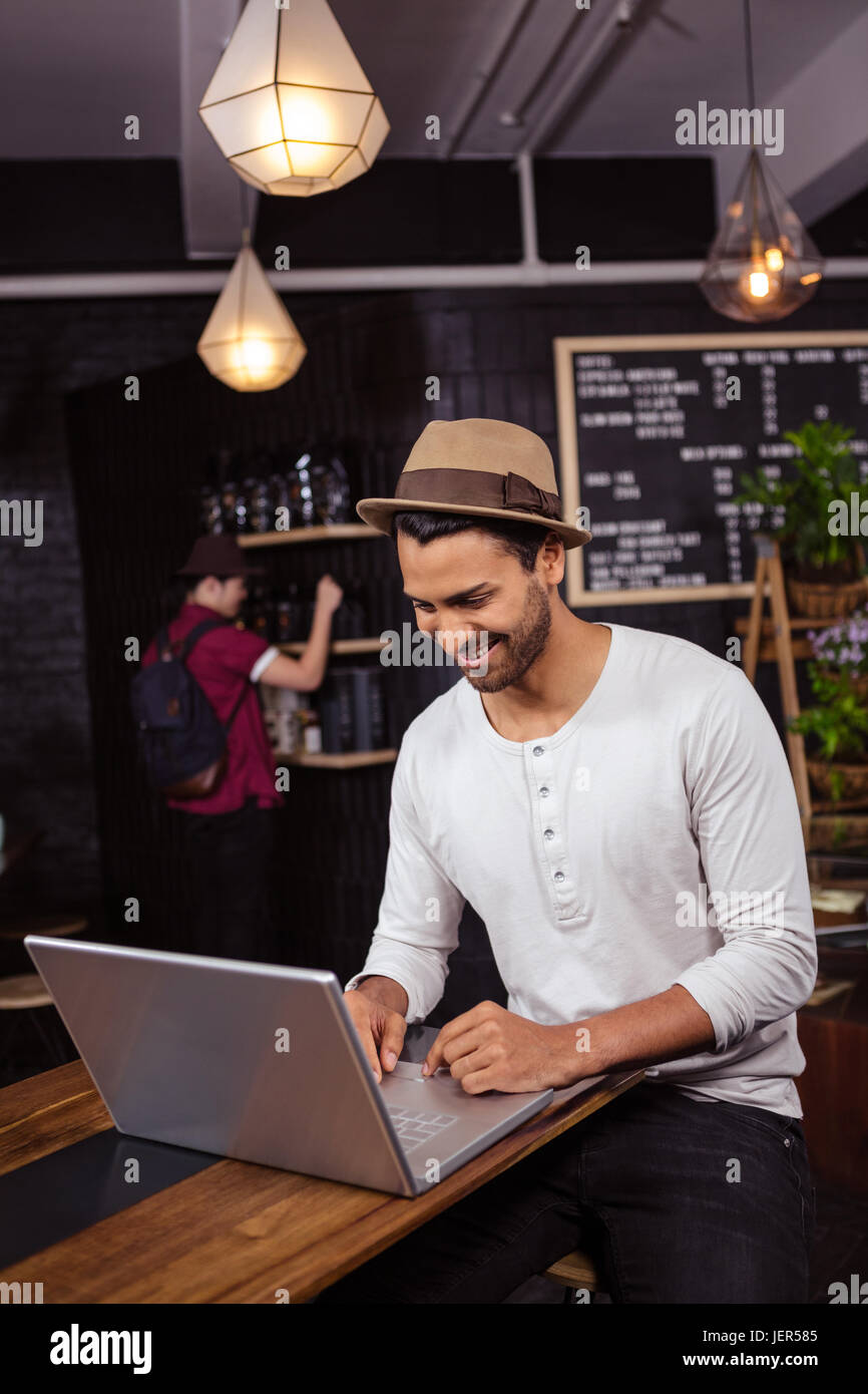 Man using a laptop Stock Photo - Alamy