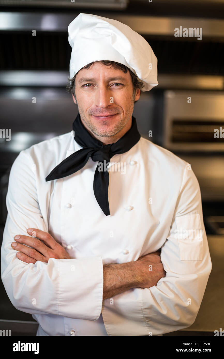 Portrait of chef in kitchen Stock Photo - Alamy