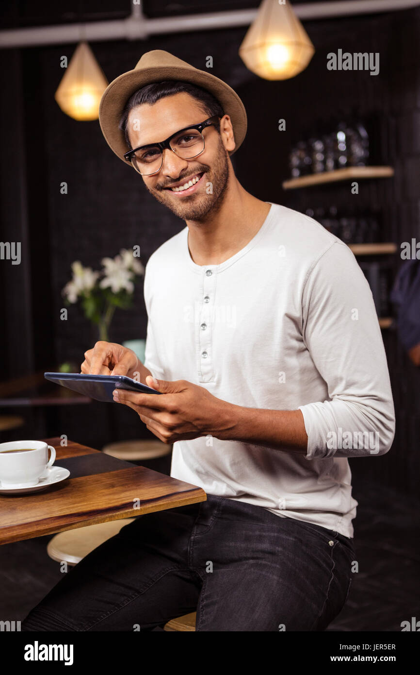 Man using a tablet Stock Photo - Alamy