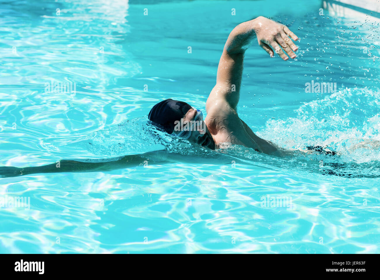 Fit swimmer doing the front crawl Stock Photo - Alamy