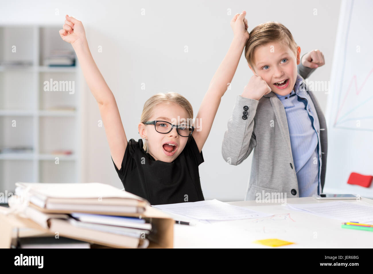 Children working in office like adult business people Stock Photo - Alamy