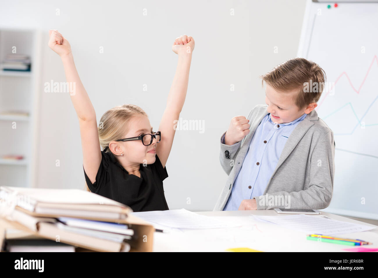 Children working in office like adult business people Stock Photo - Alamy