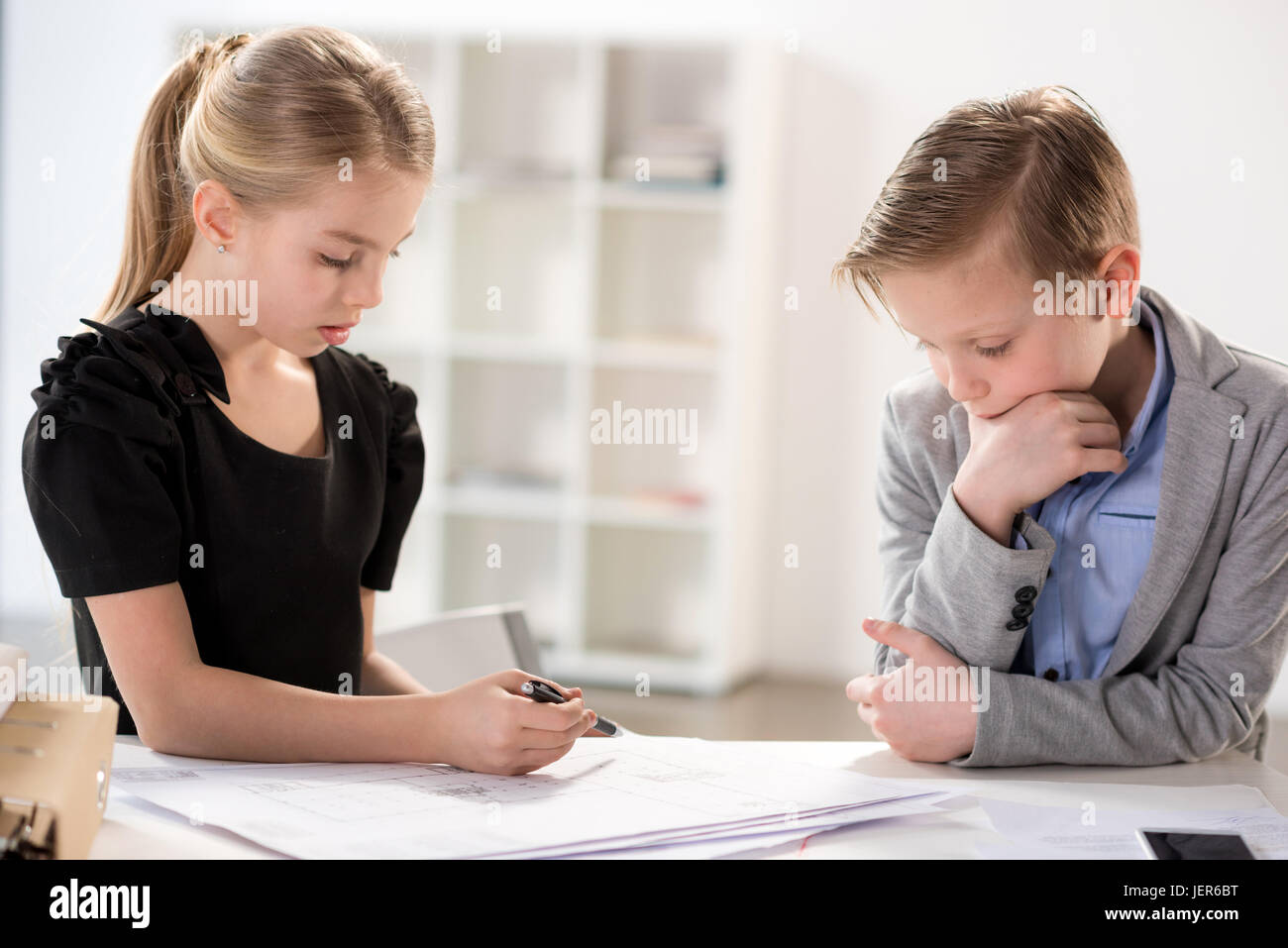 Children working in office like adult business people Stock Photo - Alamy