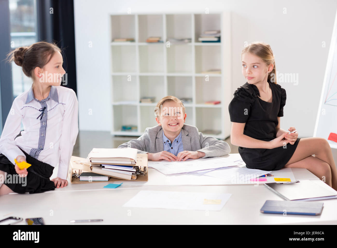 Children working in office like adult business people Stock Photo - Alamy