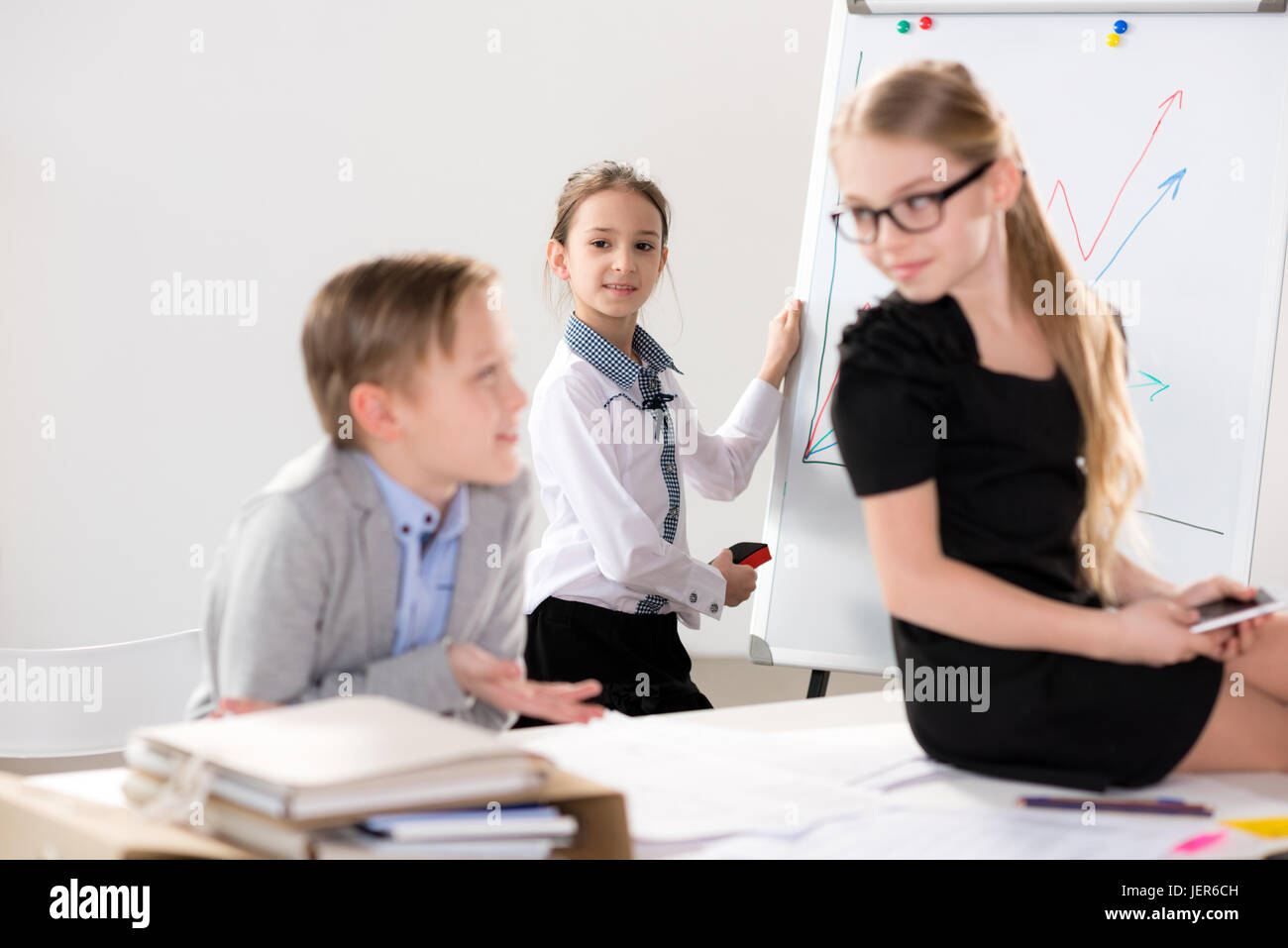 Children working in office like adult business people Stock Photo - Alamy