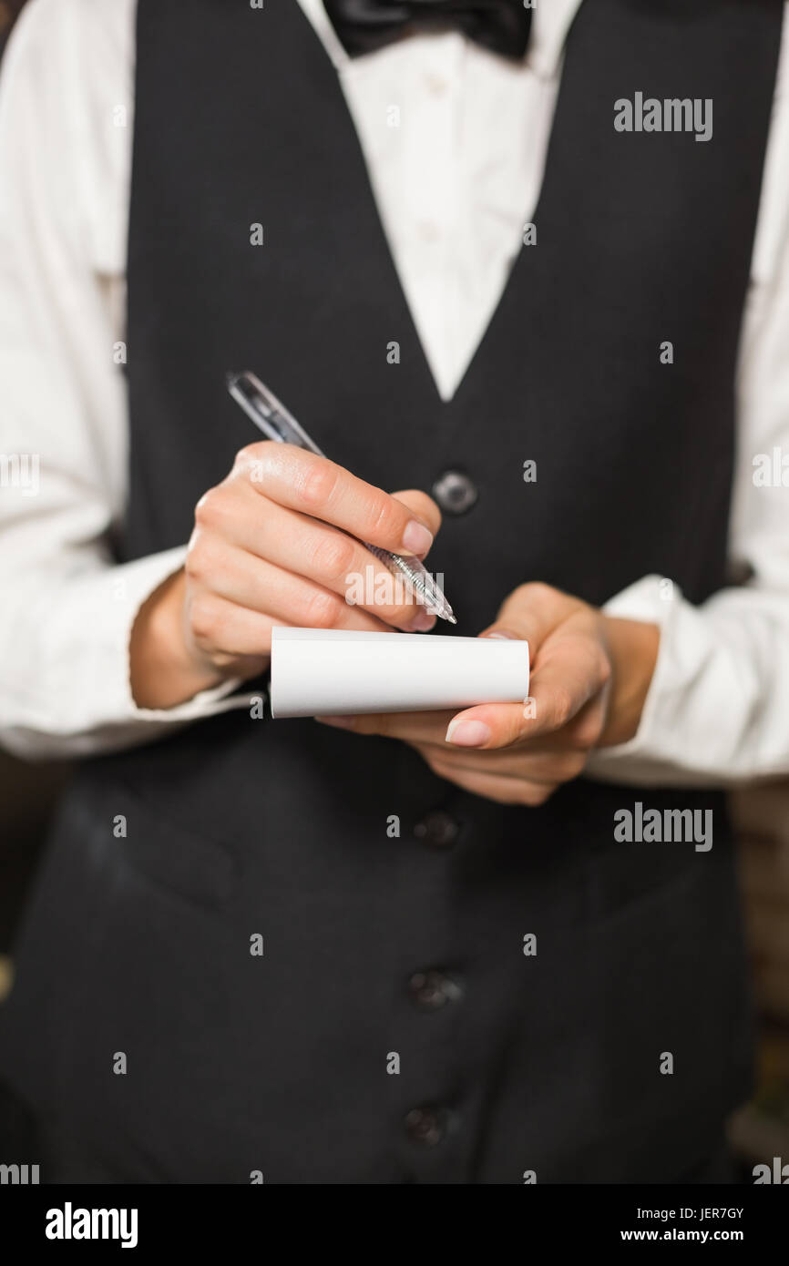 Bartender taking an order Stock Photo - Alamy