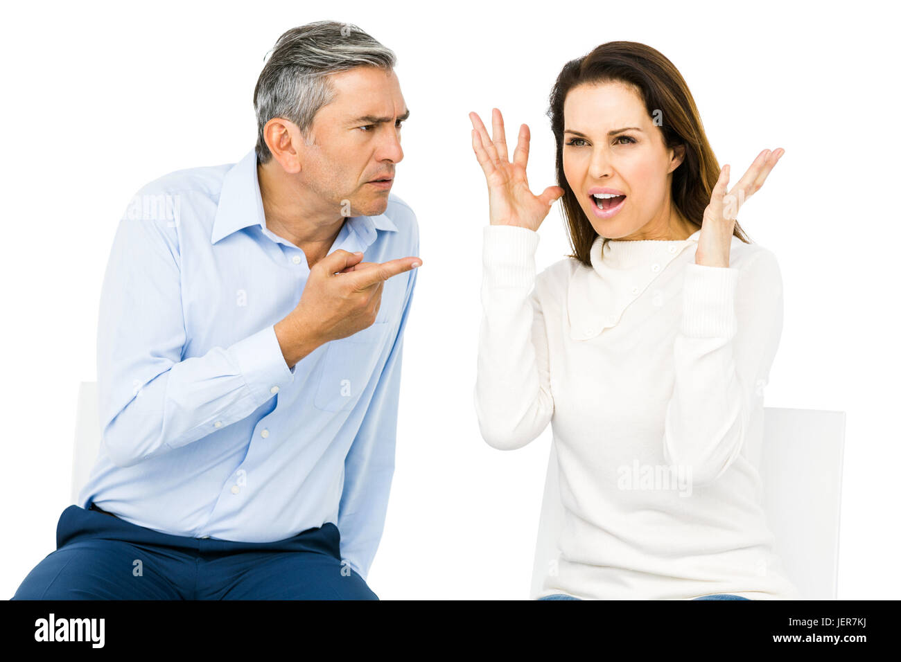 Couple arguing while sitting Stock Photo - Alamy