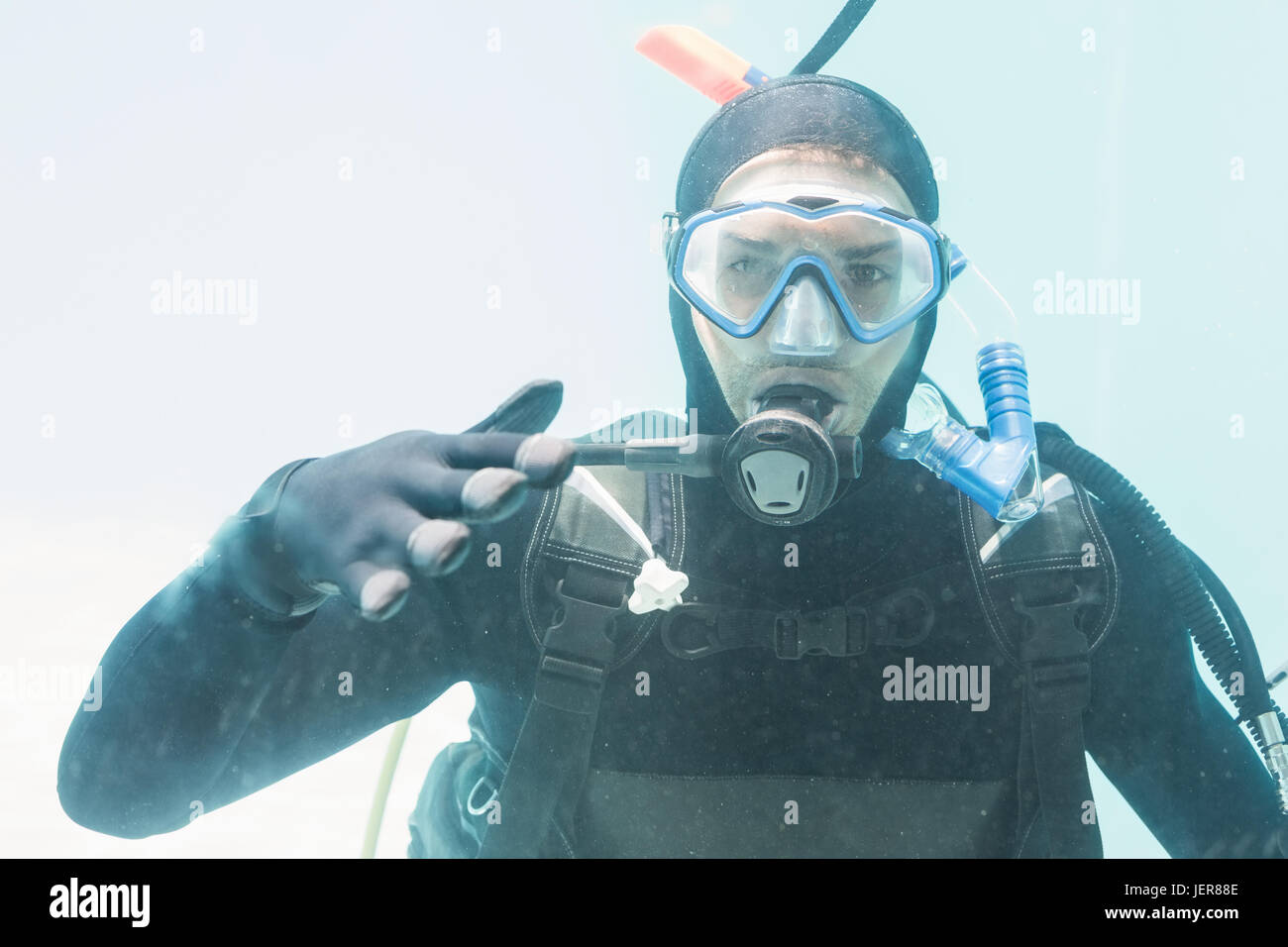 Man diving swimming pool wet suit hi-res stock photography and images ...