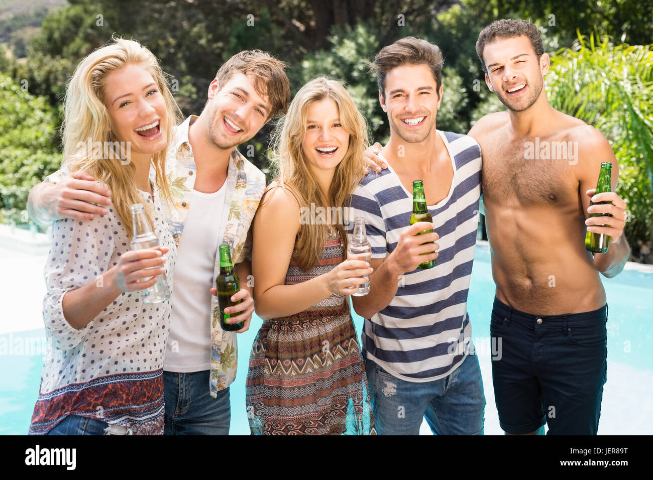 Group of happy friend having beer Stock Photo - Alamy