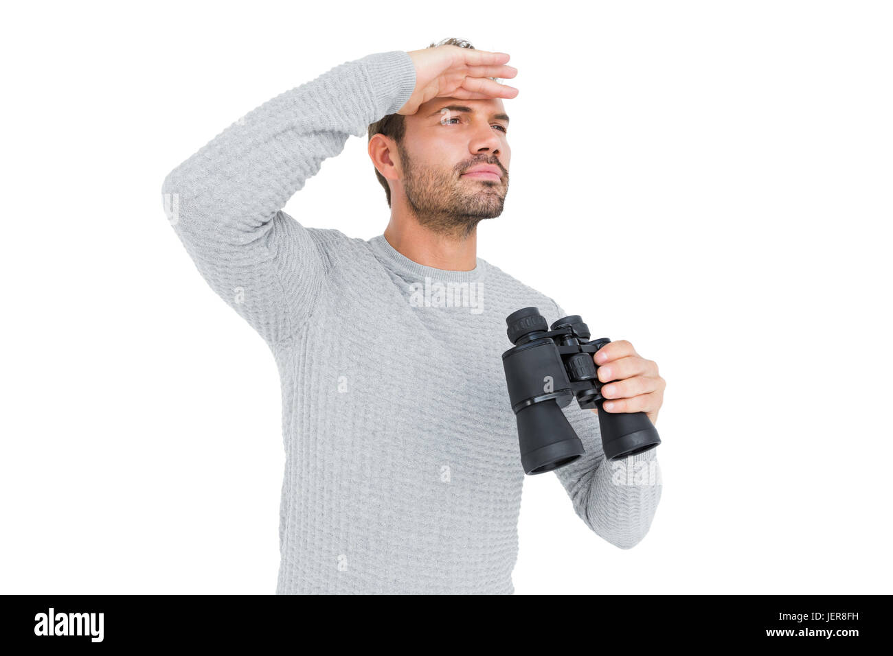 Young man with binocular Stock Photo - Alamy