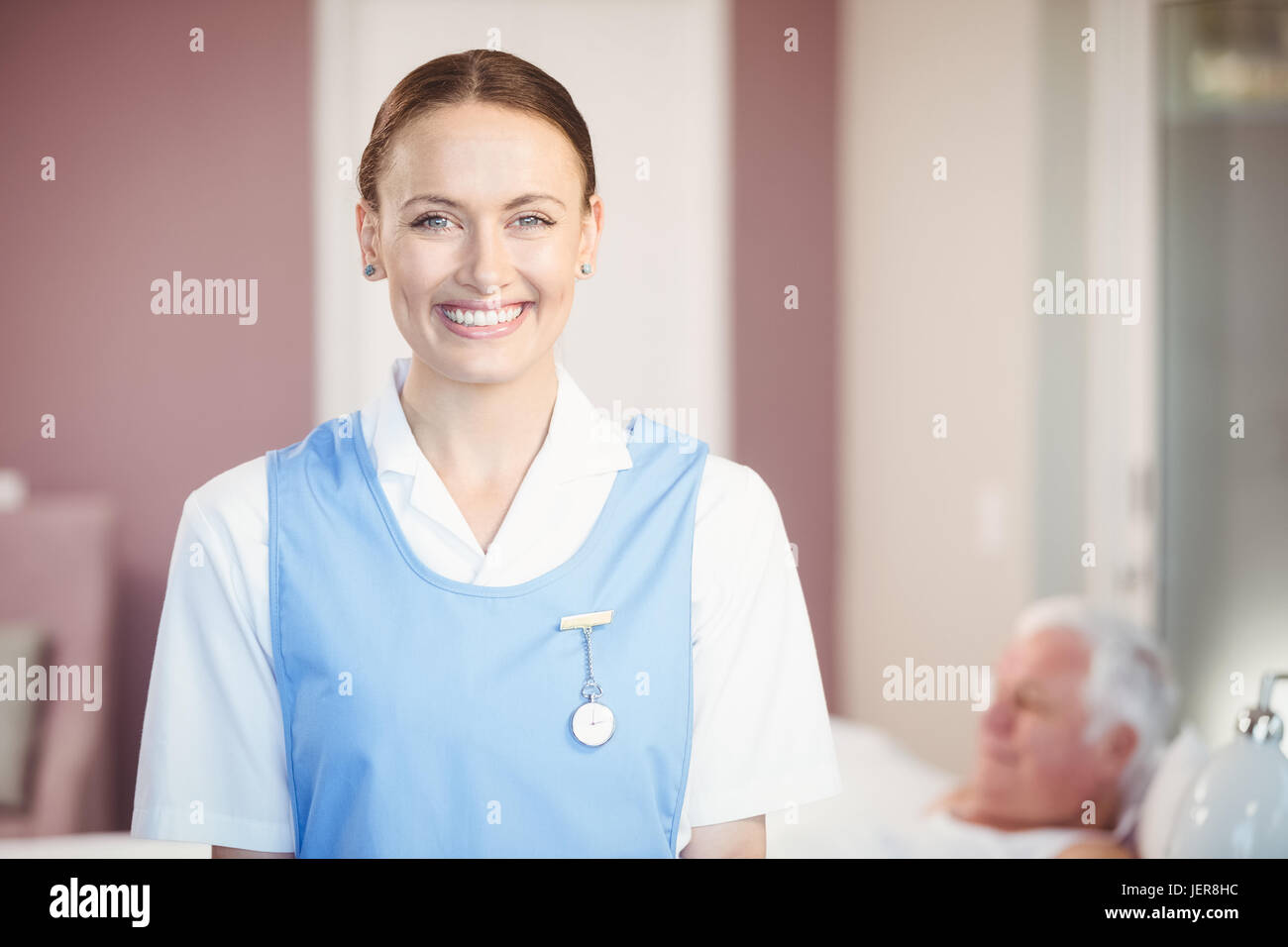 Portrait of happy beautiful nurse at home Stock Photo - Alamy