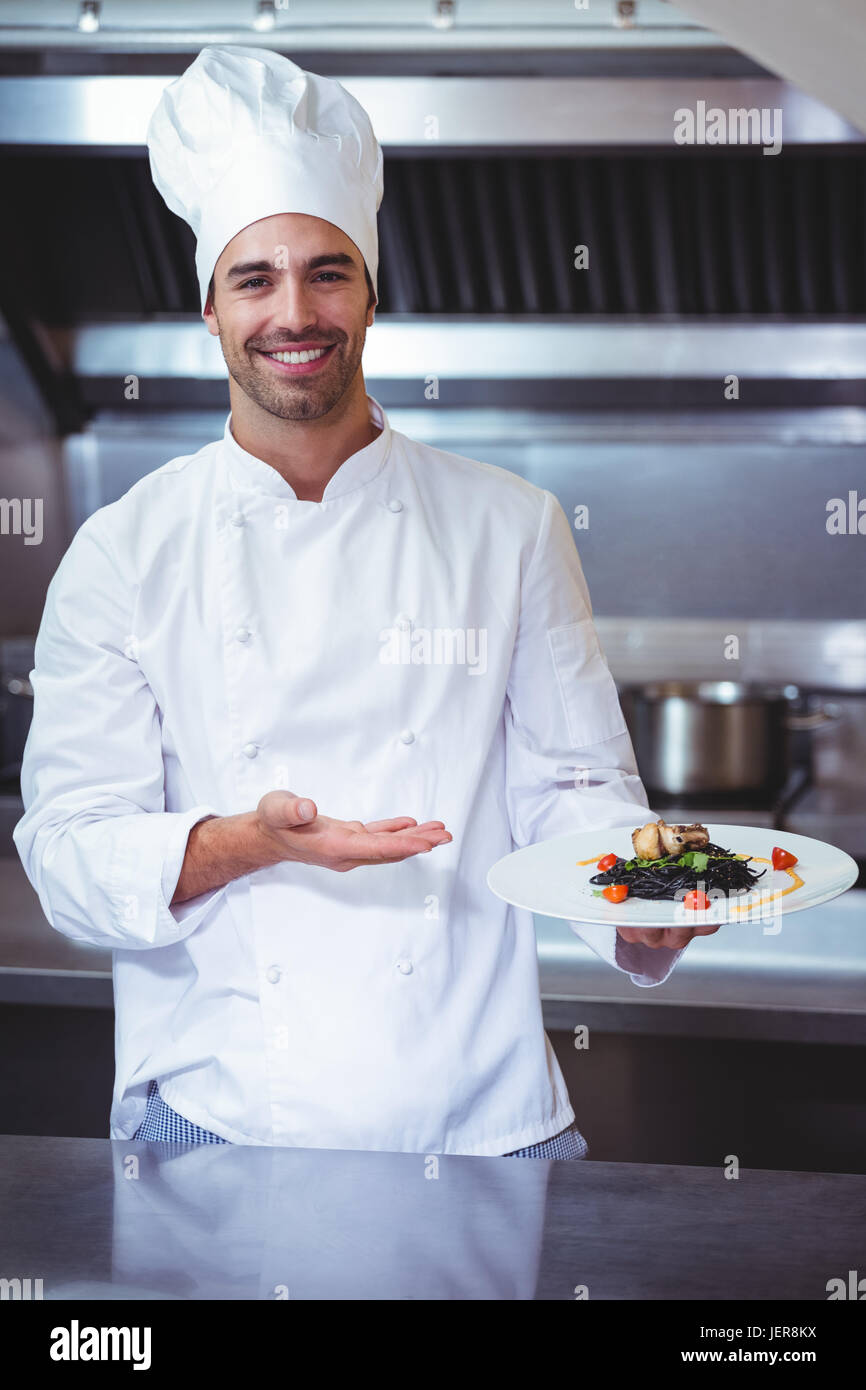 Chef showing his dish Stock Photo - Alamy