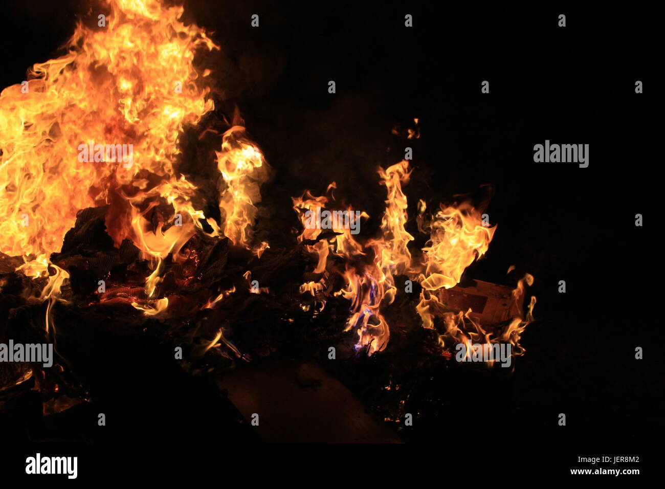 Alive fire scattering abroad the wood eating away at the substance ...