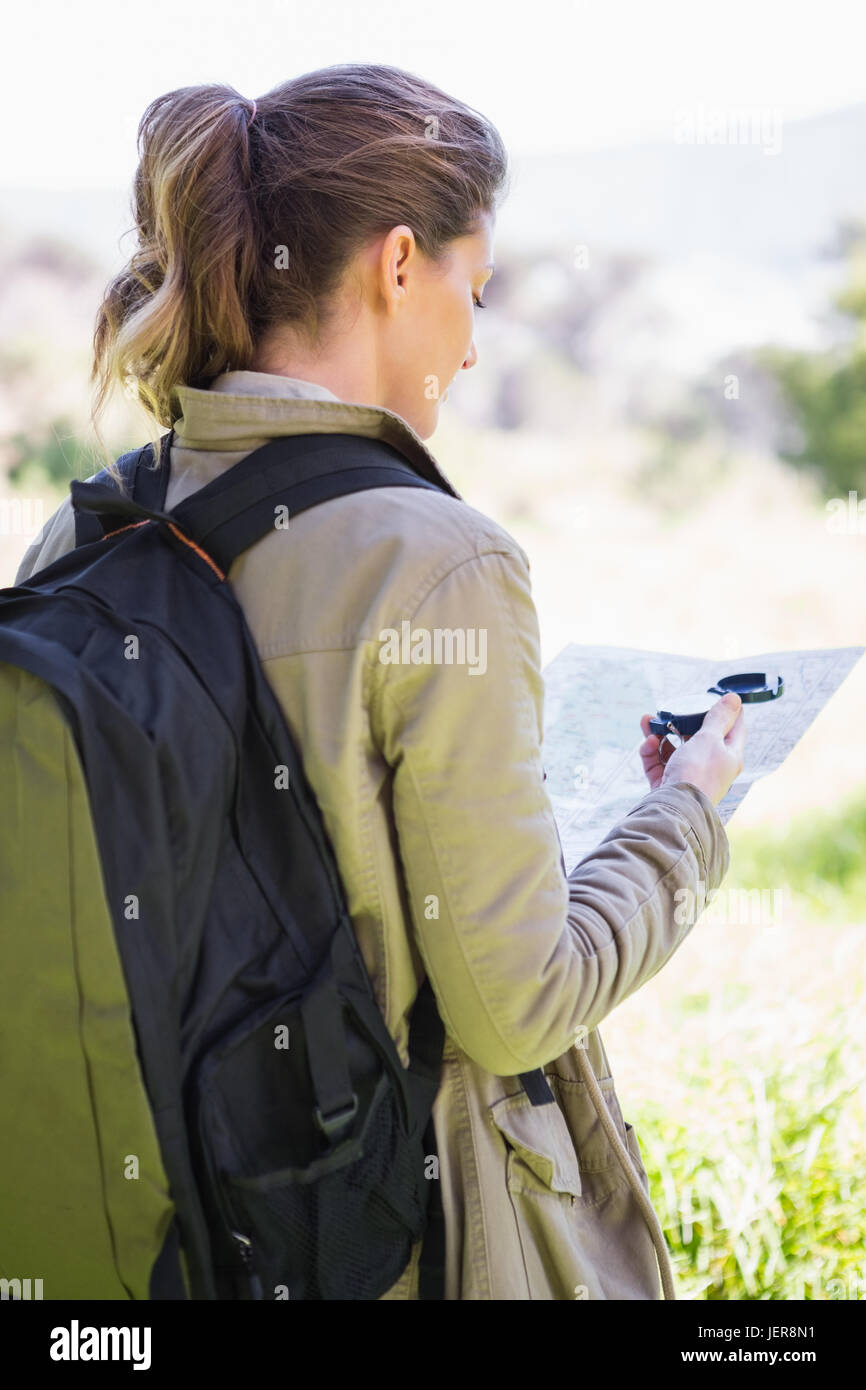 Woman map compass hi-res stock photography and images - Alamy