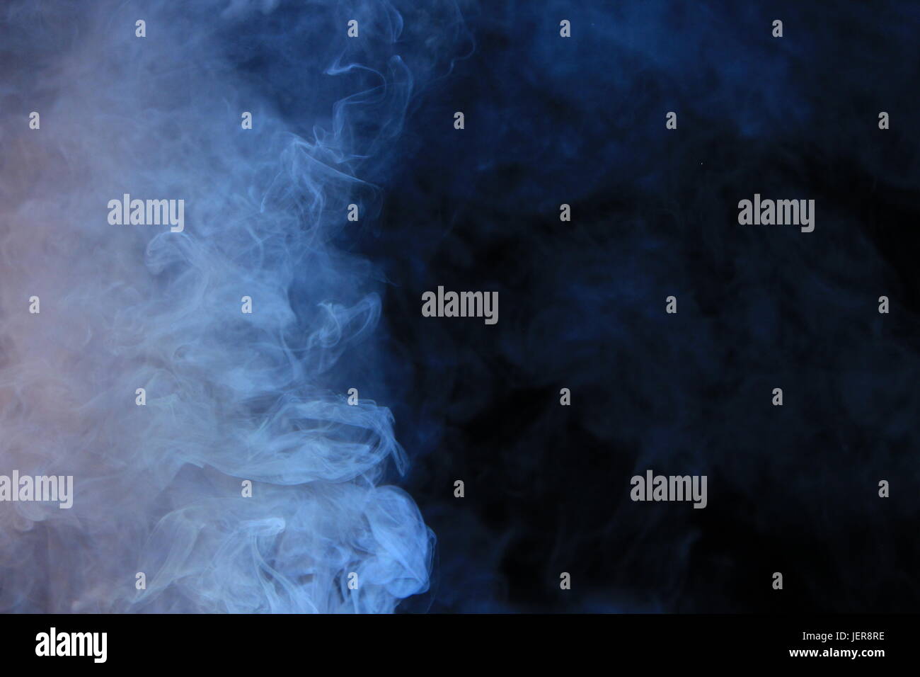 This unique photo of cool blue smoke is very eye catching Stock Photo ...