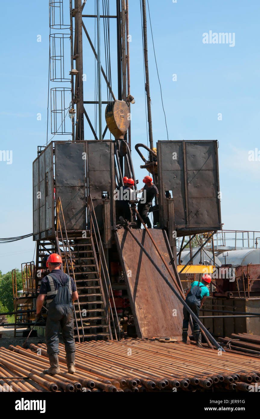 oil field, the oil workers are working Stock Photo - Alamy