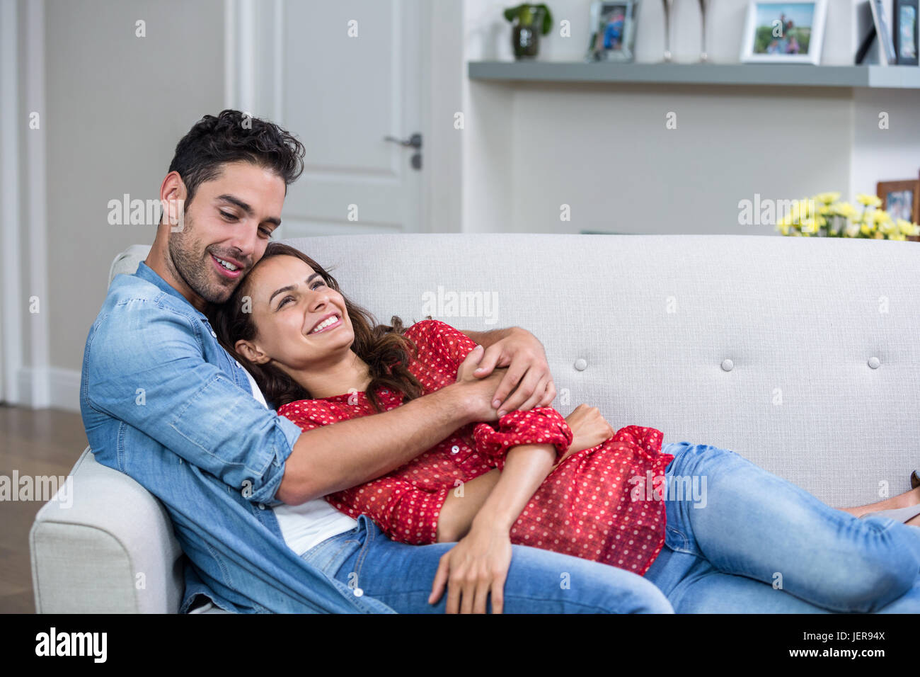 Romantic couple hugging at home Stock Photo - Alamy