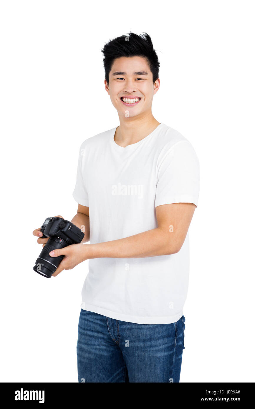 Young man using camera Stock Photo - Alamy