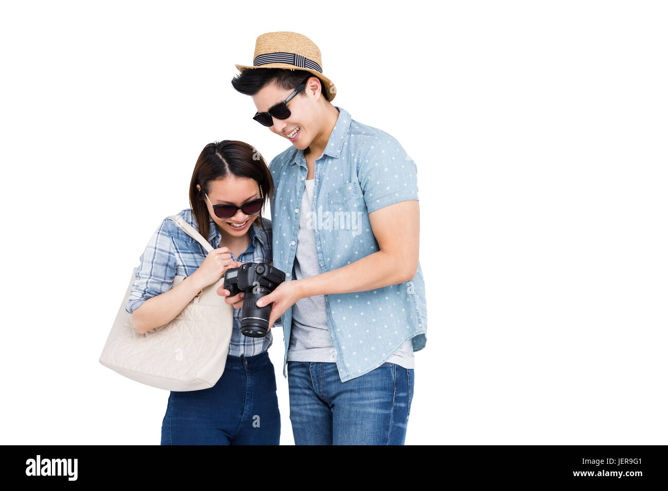Happy young couple looking in camera Stock Photo - Alamy