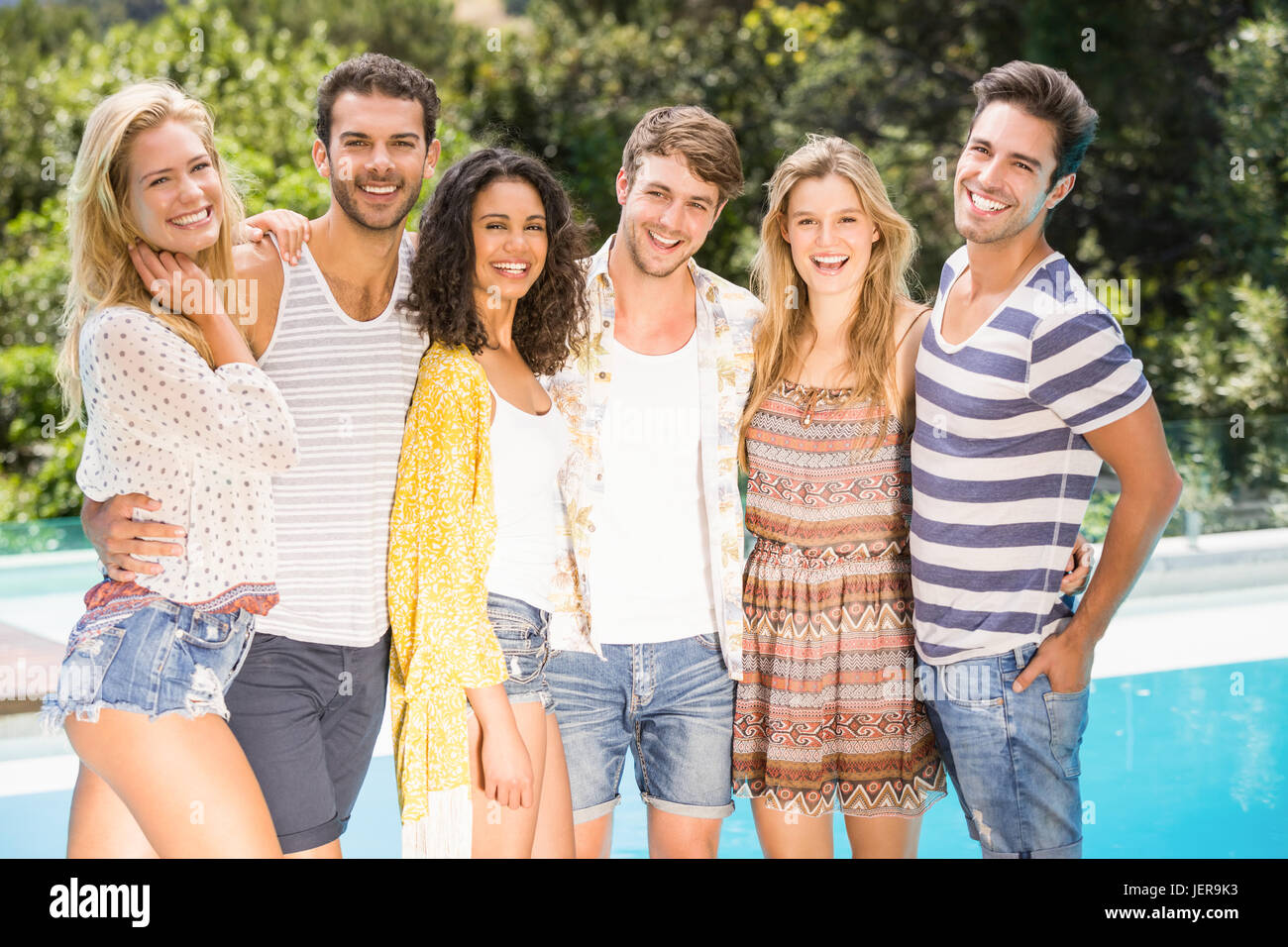 Man standing near swimming pool hi-res stock photography and images - Alamy