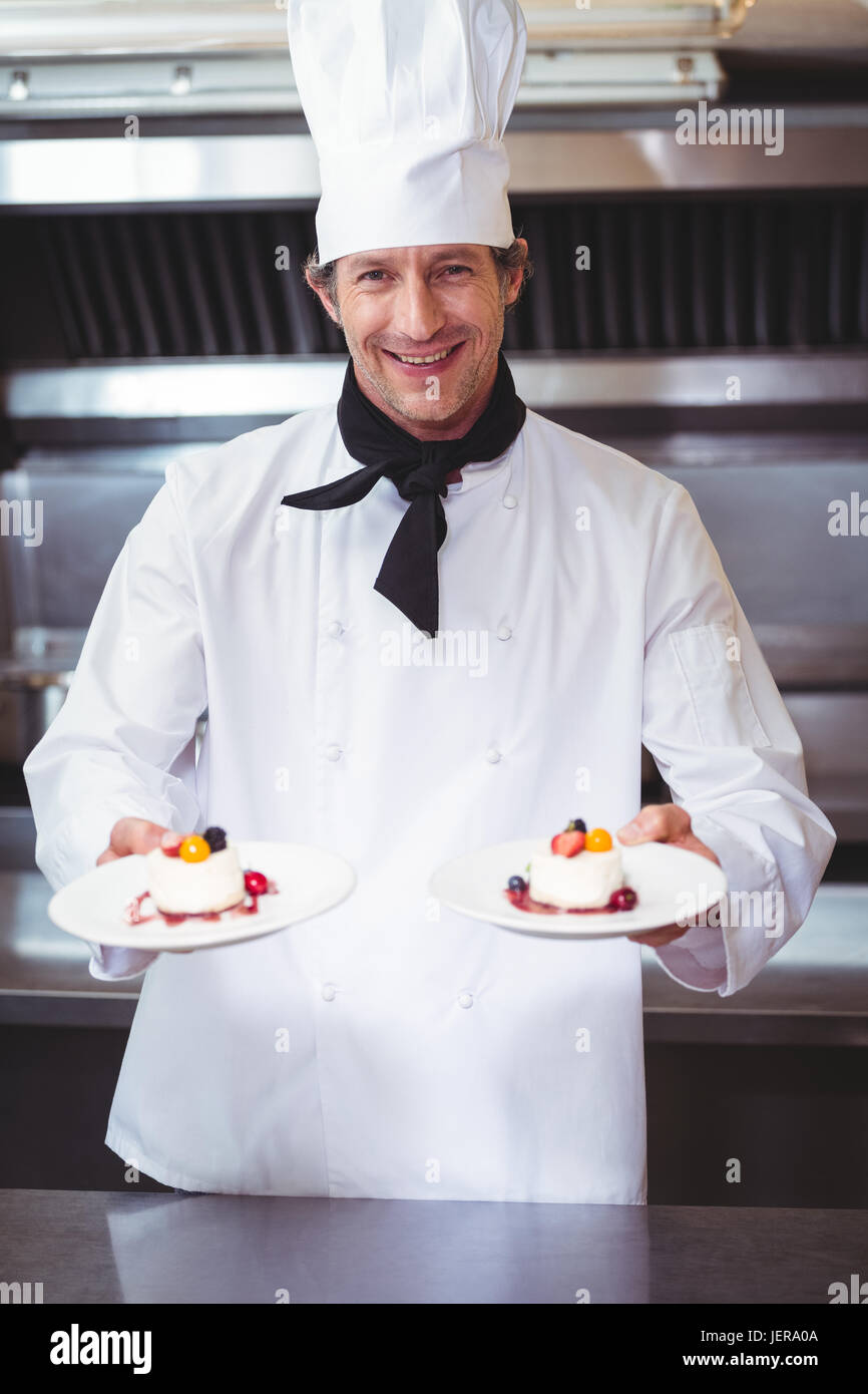 Chef holding his dish Stock Photo - Alamy