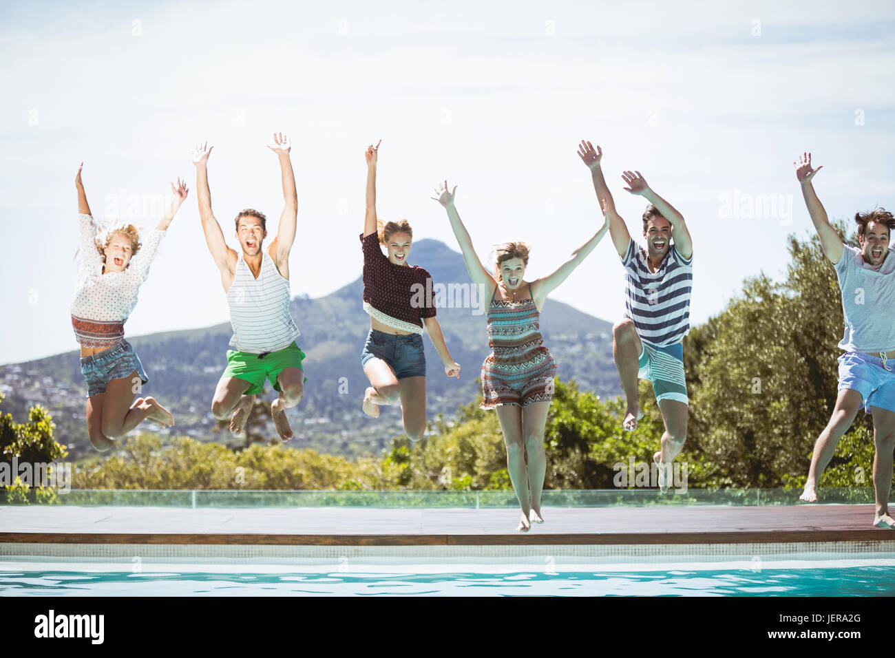 Jumping in pool female hi-res stock photography and images - Alamy