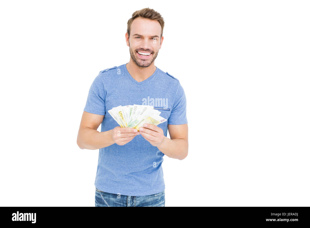 Young man counting currency notes Stock Photo - Alamy