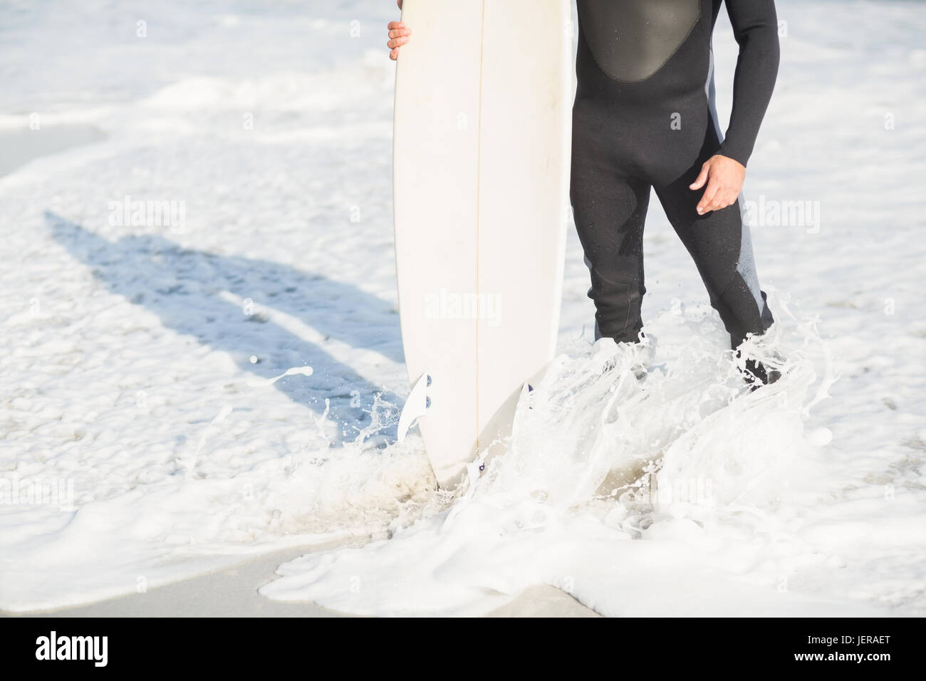 Surfers feet on the beach Stock Photo - Alamy
