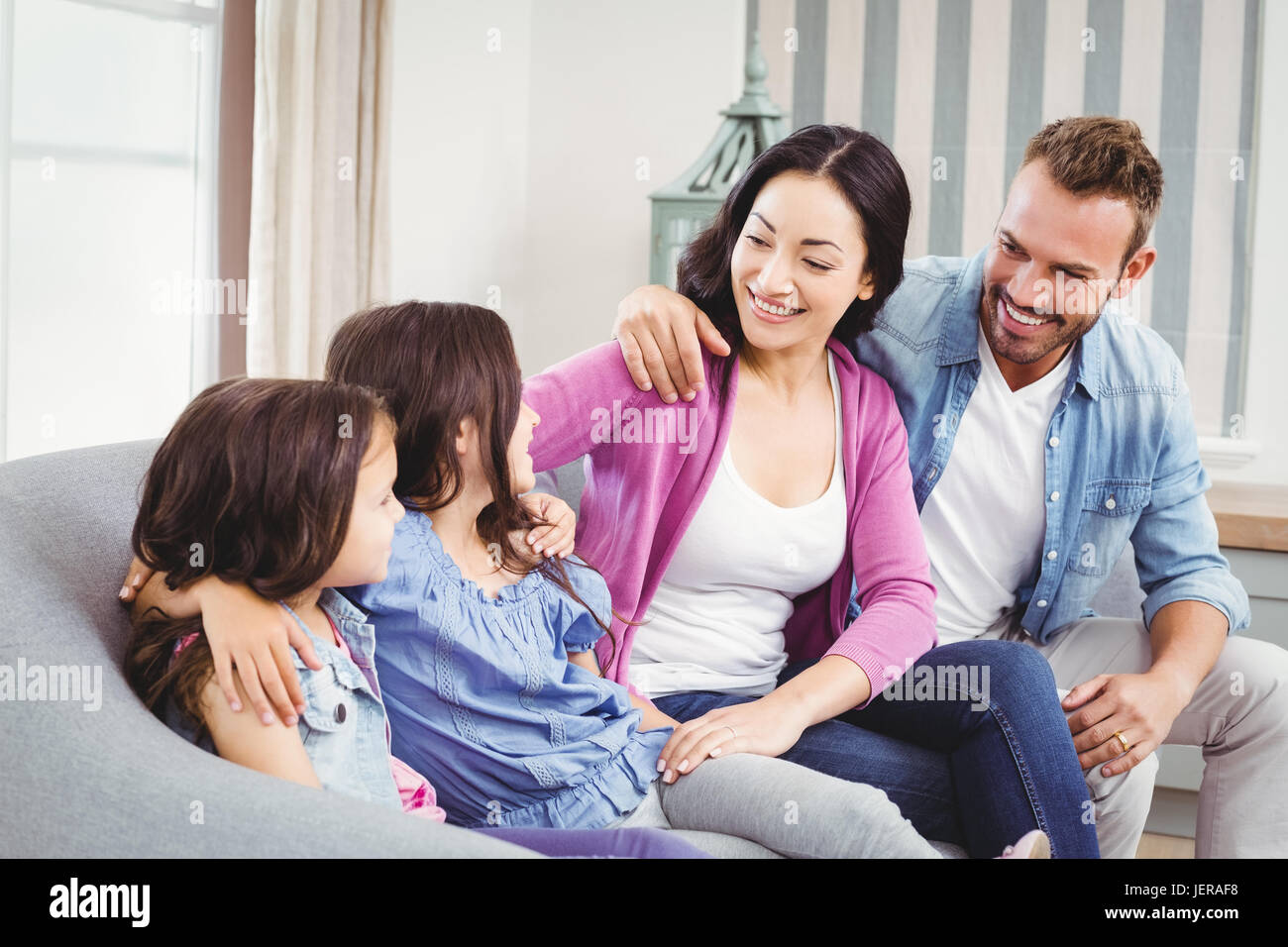 Parents children sitting on hi-res stock photography and images - Alamy