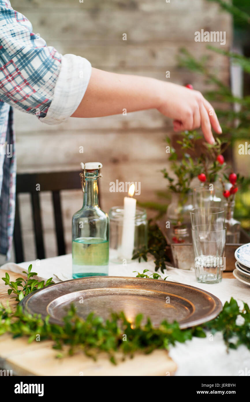 Person preparing table setting Stock Photo - Alamy